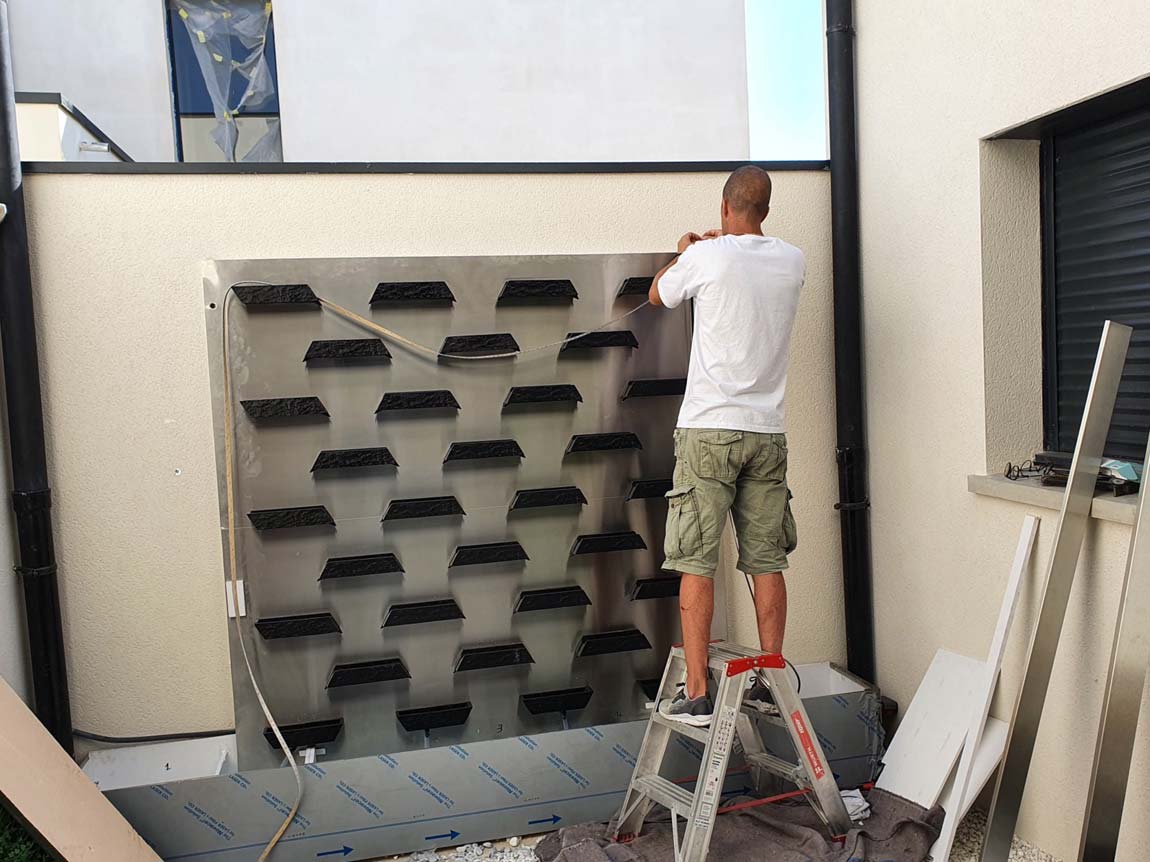 Mur d’eau à becs en inox brossé - Histoire d'eau